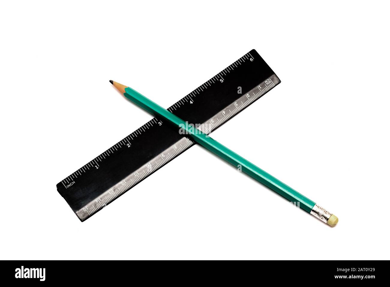 Pencil and black ruler isolated on white background Stock Photo - Alamy