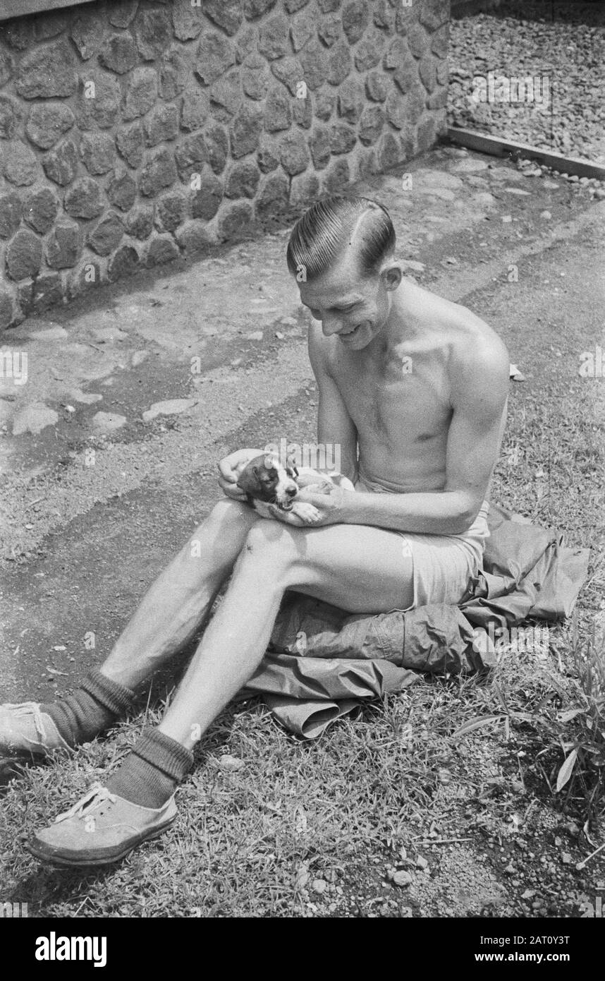 Poerwokerto-Banjoemas A Dutch man with a puppy Date: December 14, 1947 ...