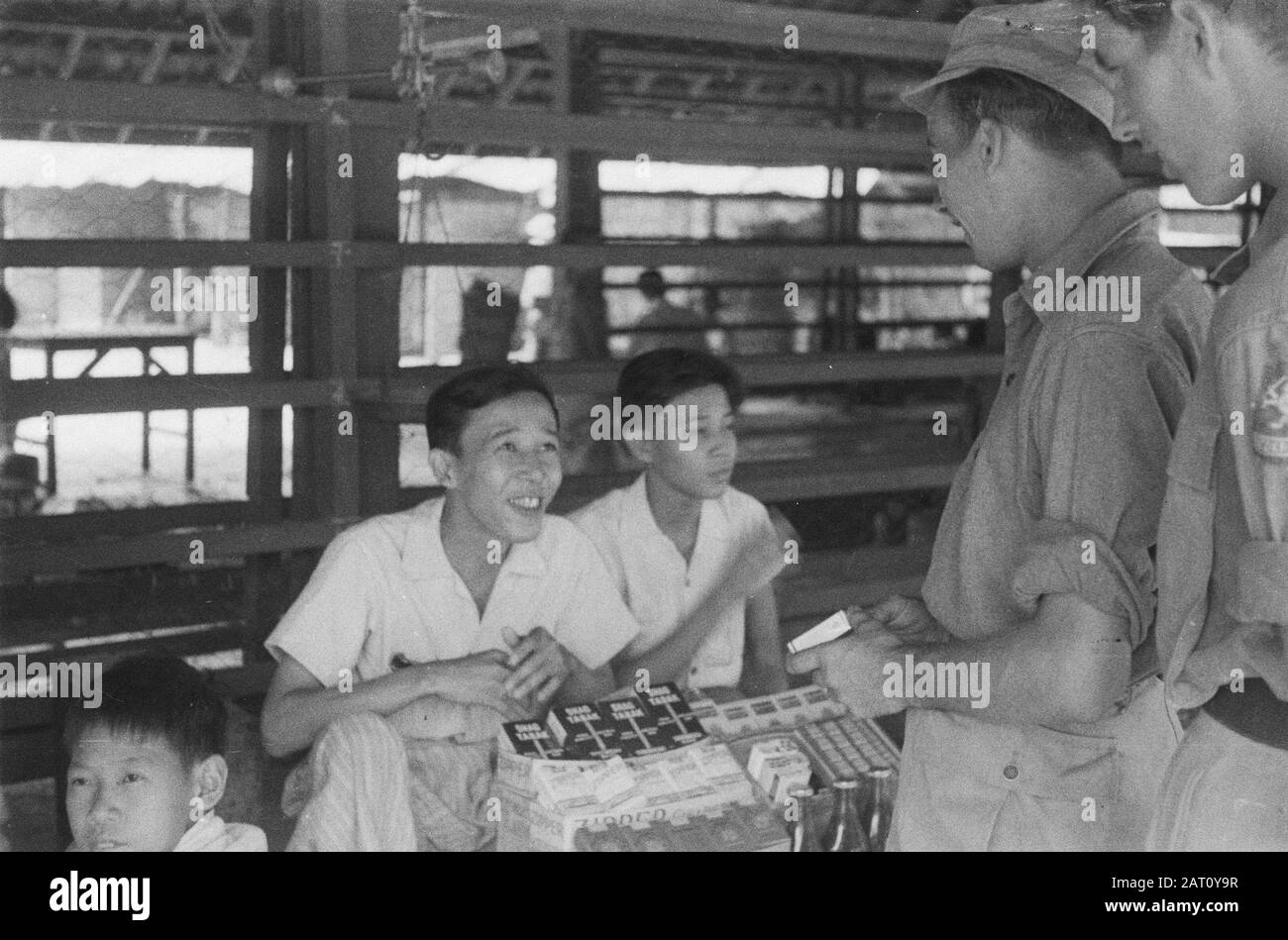 A Dutch soldier at a toko Date: 1946 Location: Indonesia, Dutch East ...
