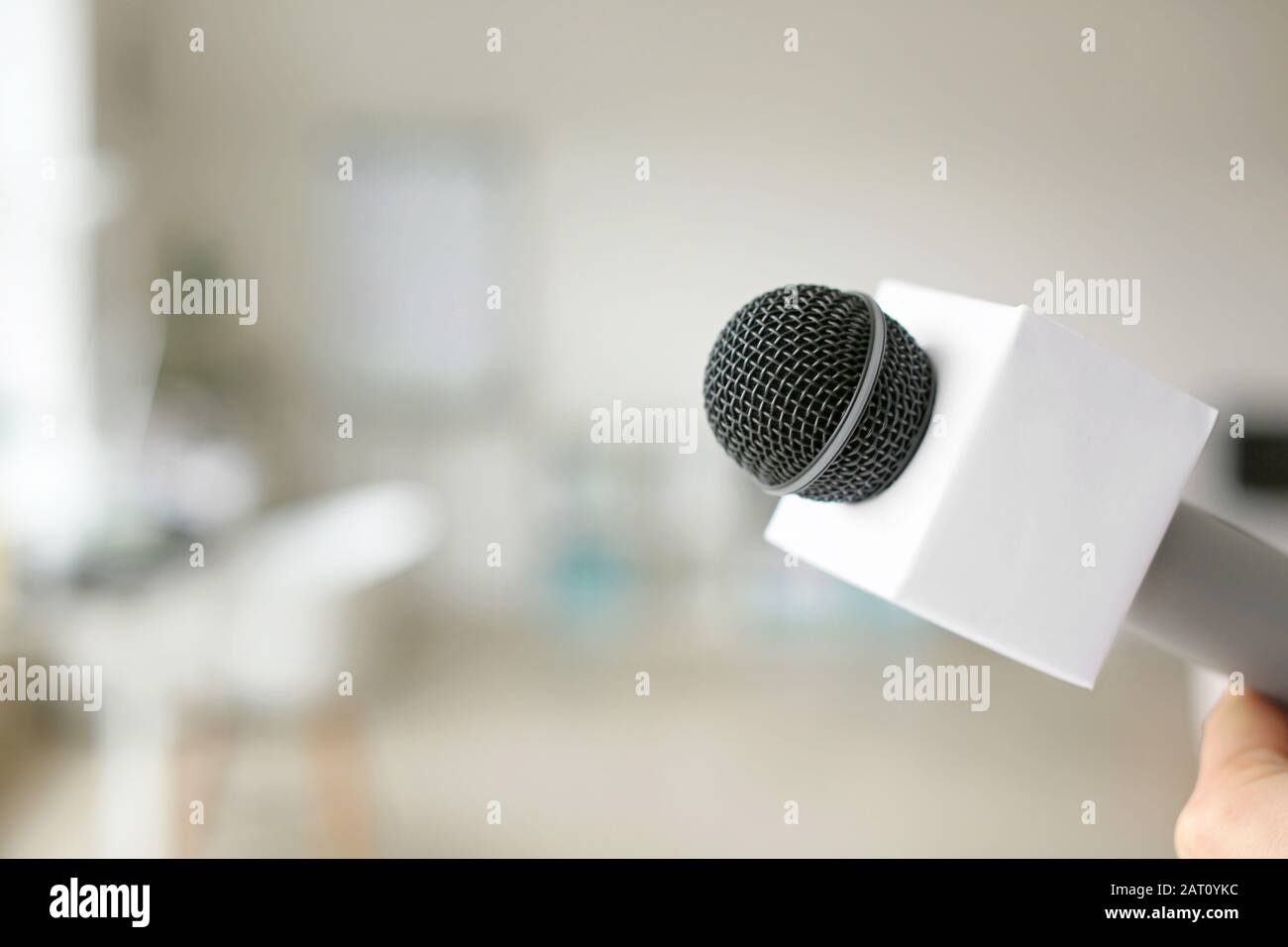 Woman reporter holding microphone in hi-res stock photography and ...