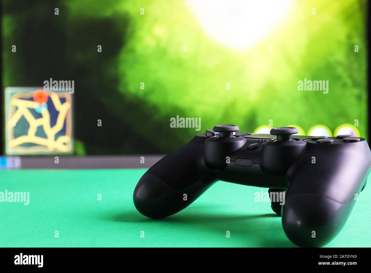 Modern game pad on table Stock Photo - Alamy