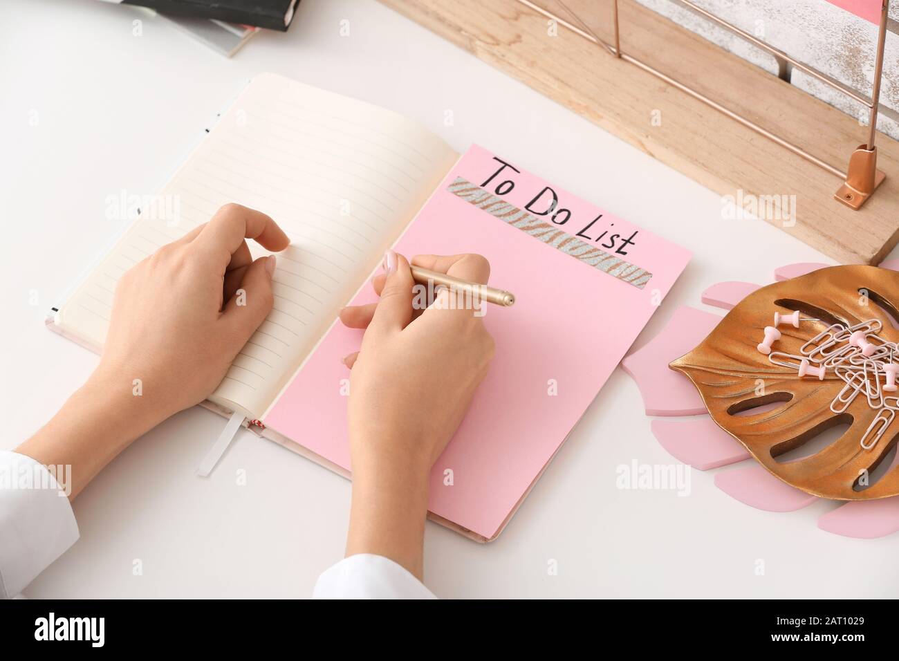 Woman making list table hi-res stock photography and images - Alamy