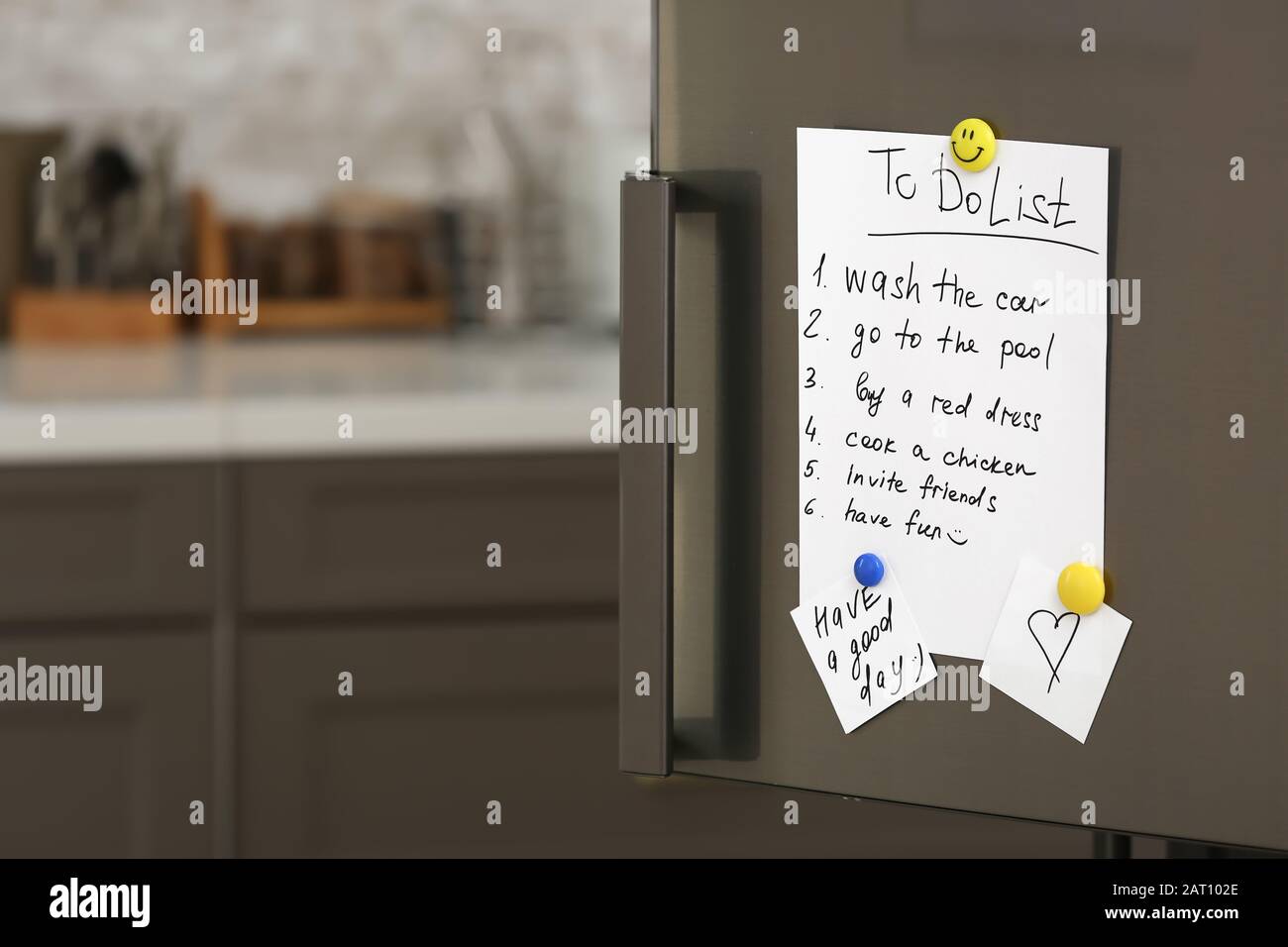 To-do list on fridge in kitchen Stock Photo - Alamy