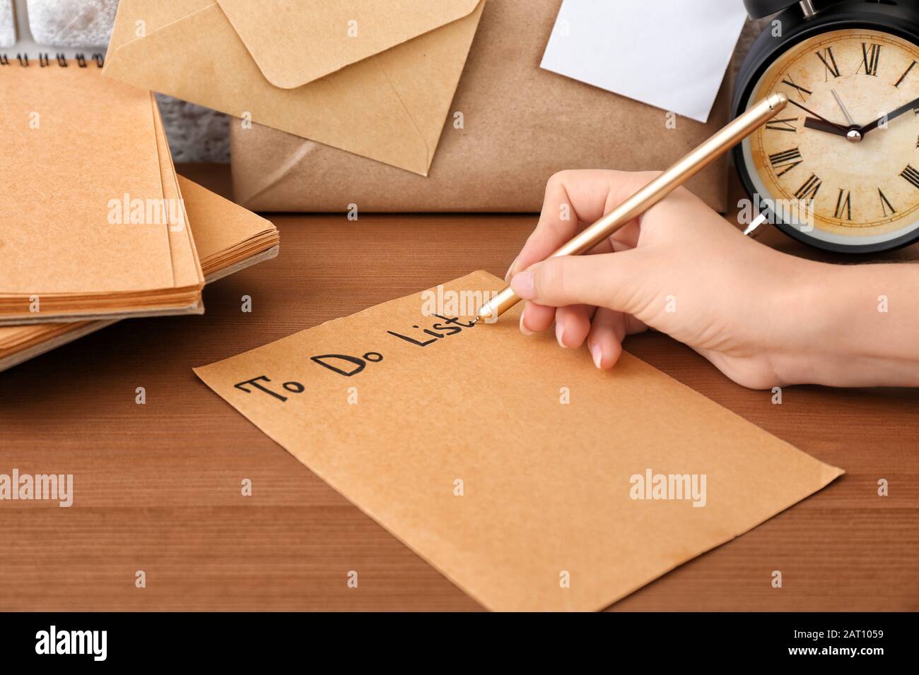 Woman making list table hi-res stock photography and images - Alamy