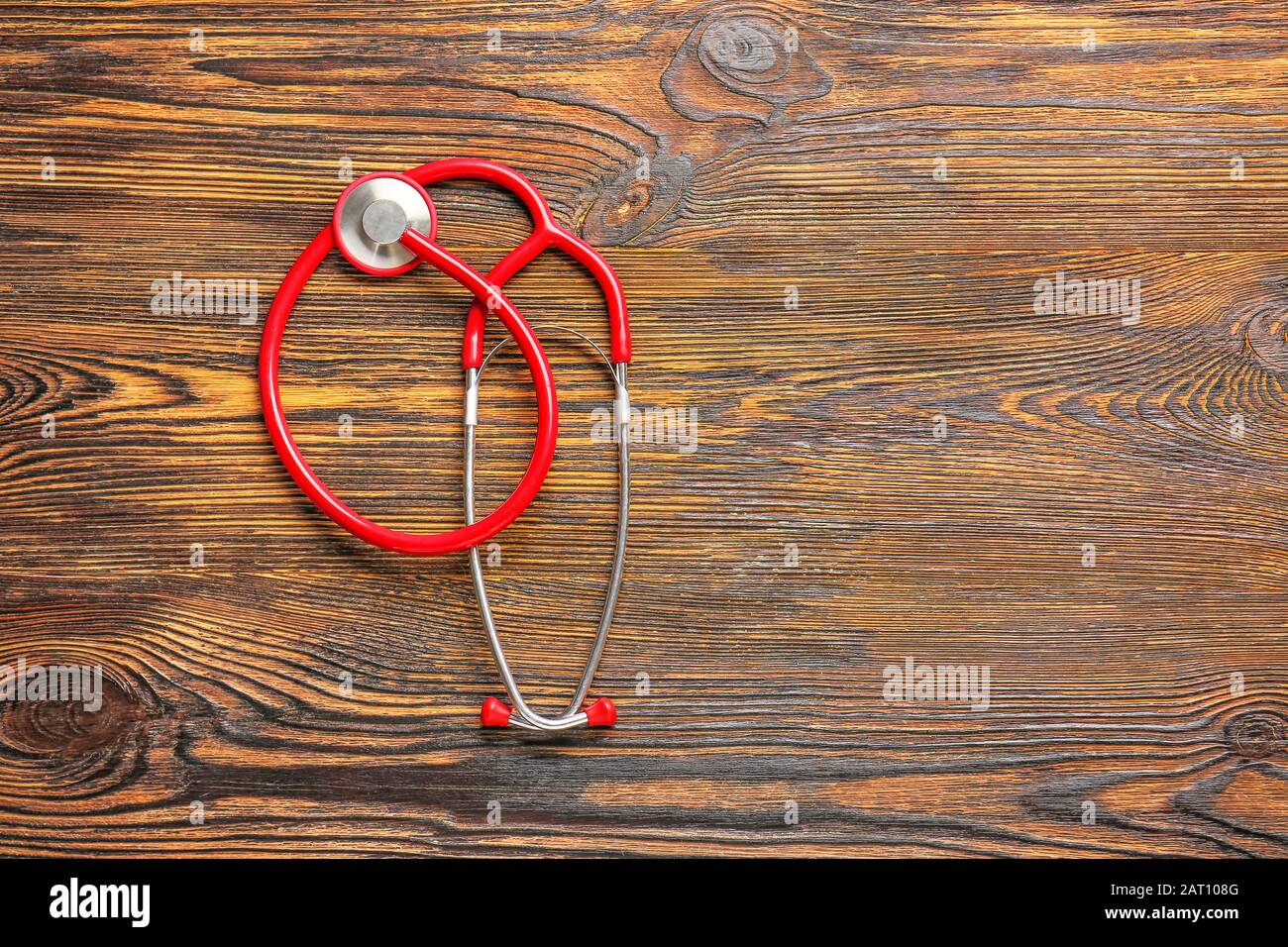 Modern stethoscope on wooden background Stock Photo - Alamy