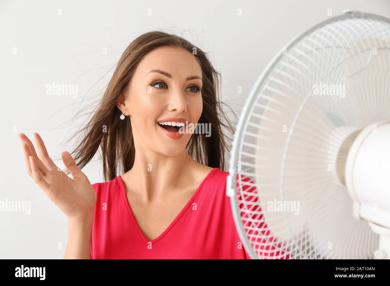 Woman electric fan caucasian hi-res stock photography and images - Alamy