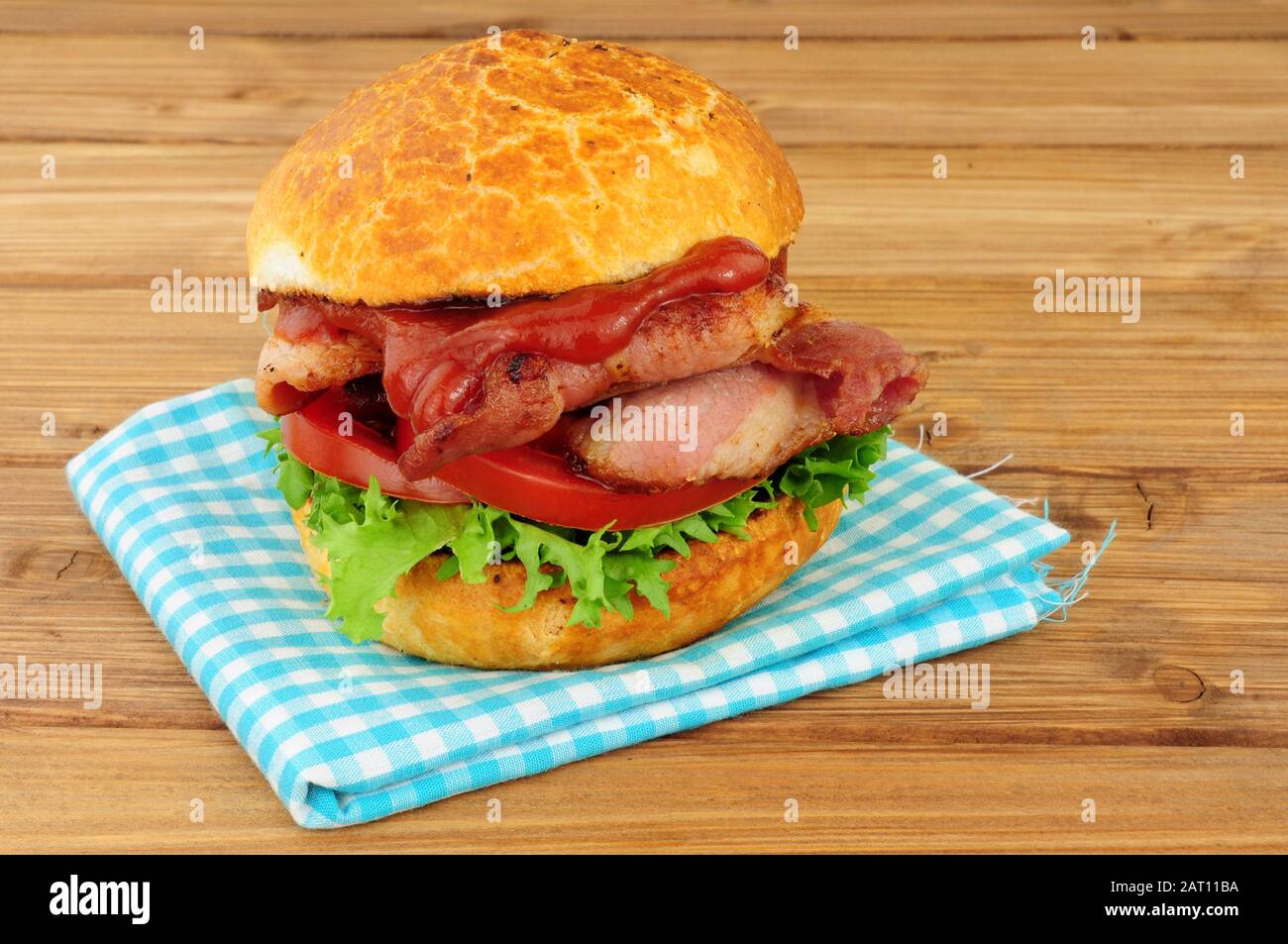 Bacon roll eating hi-res stock photography and images - Alamy