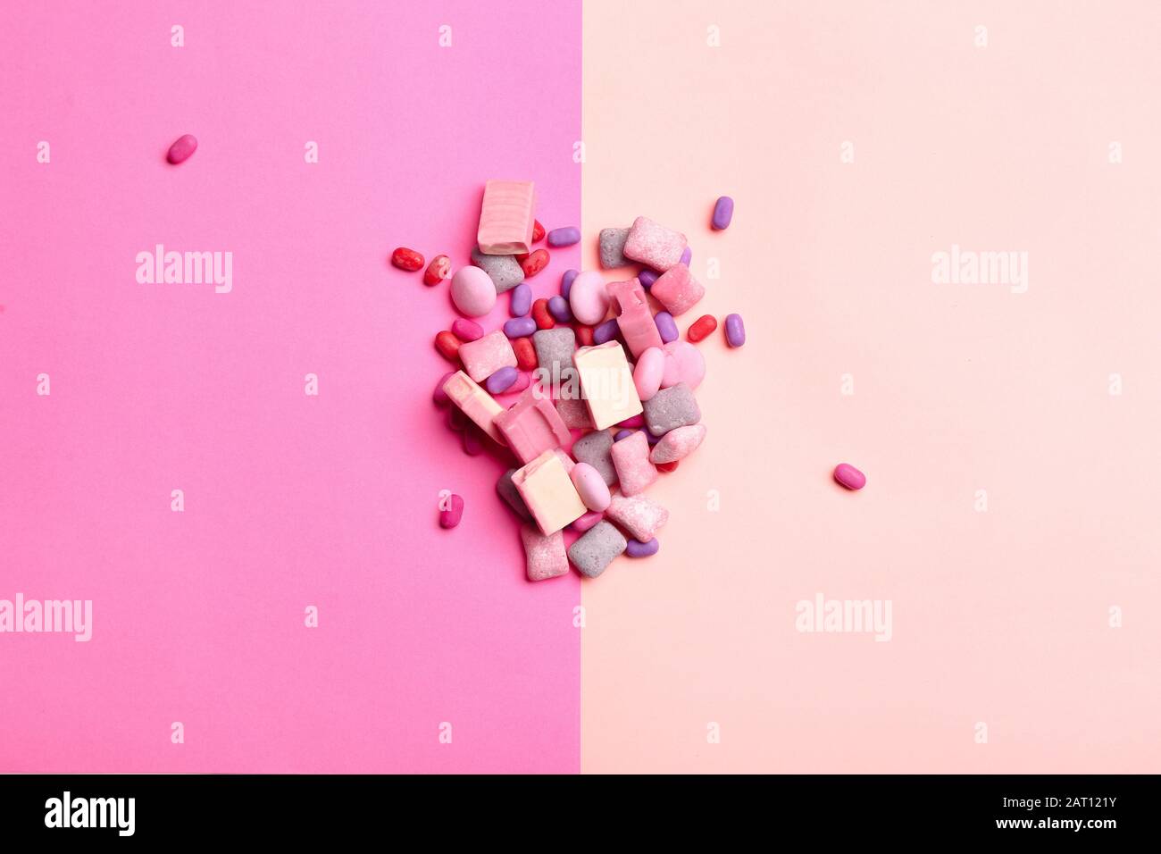 Different chewing gums on color background Stock Photo - Alamy