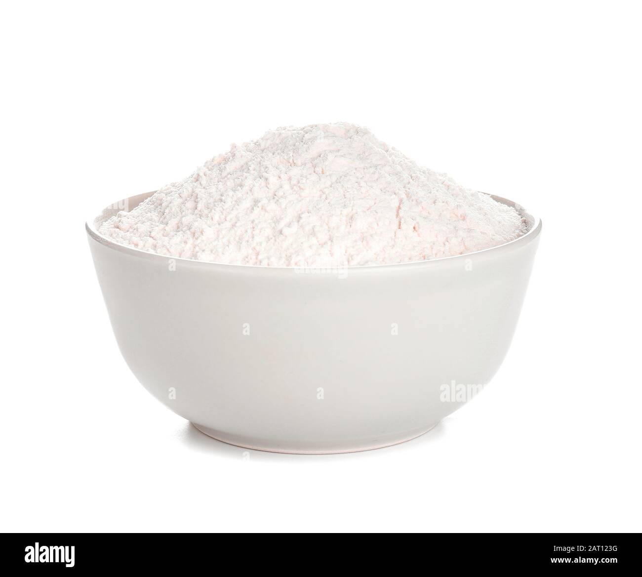 Bowl with flour on white background Stock Photo - Alamy