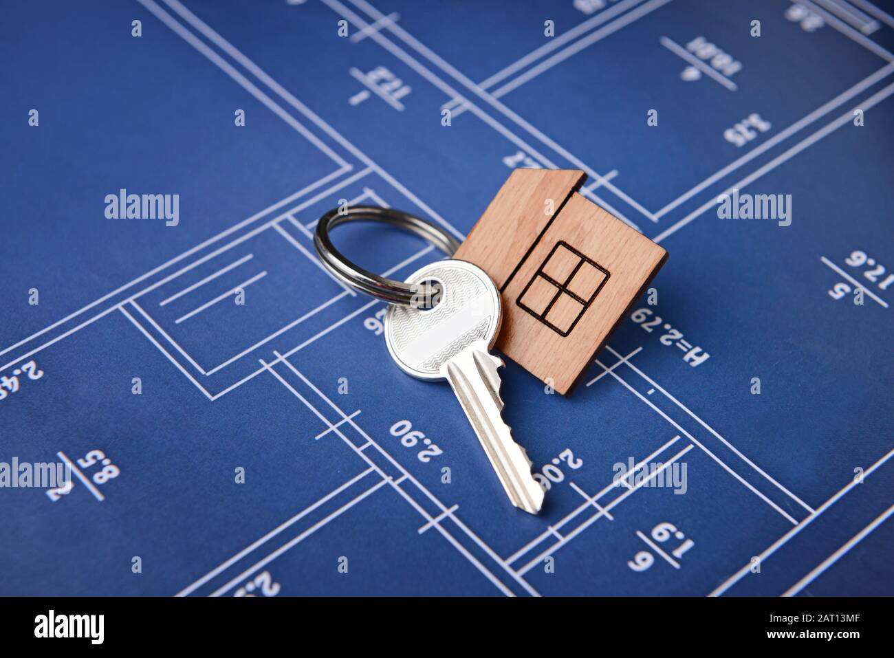 Key from house on drawing. Concept of buying new property Stock Photo ...