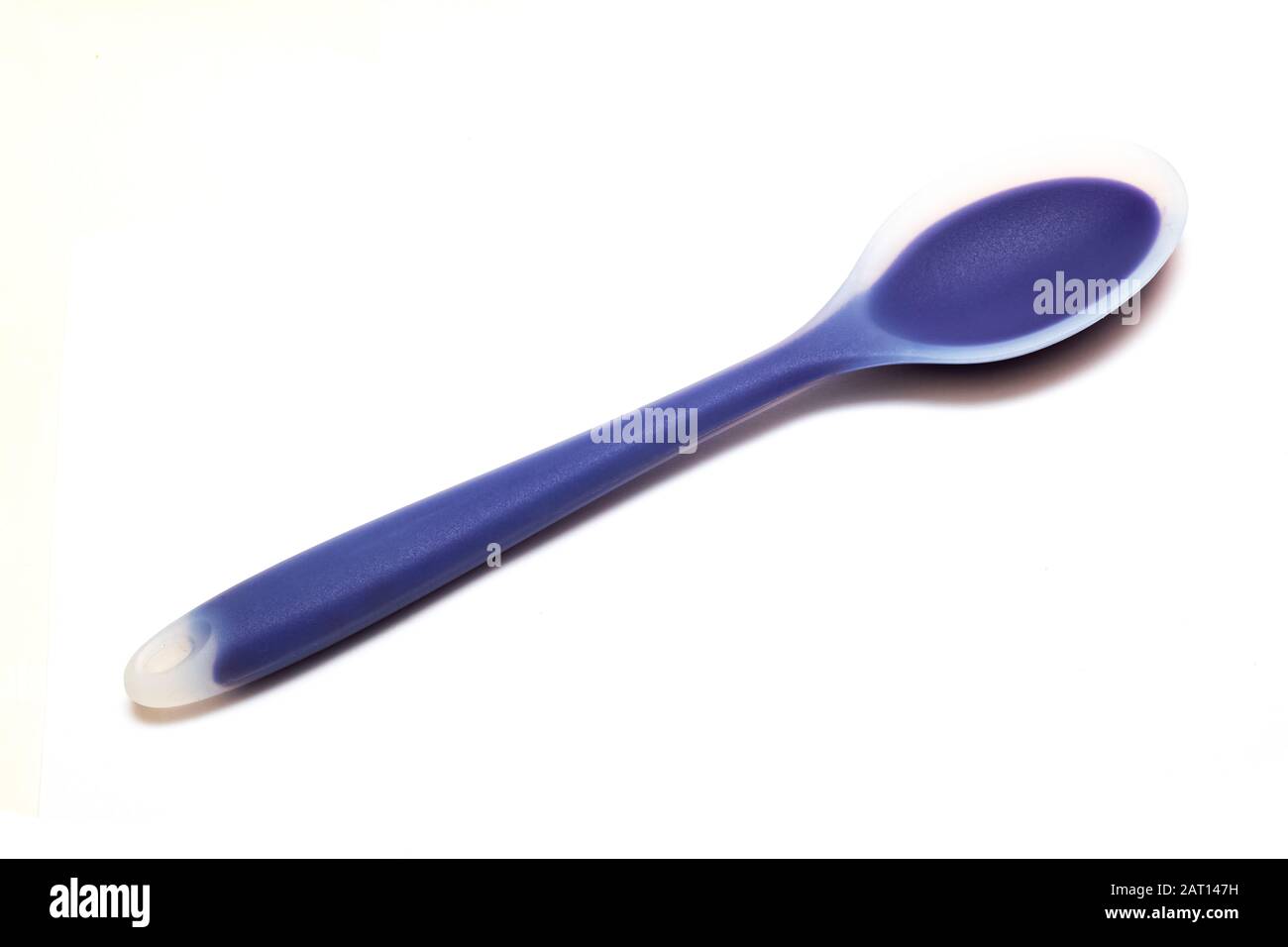 Blue silicone spoon isolated on white background Stock Photo - Alamy