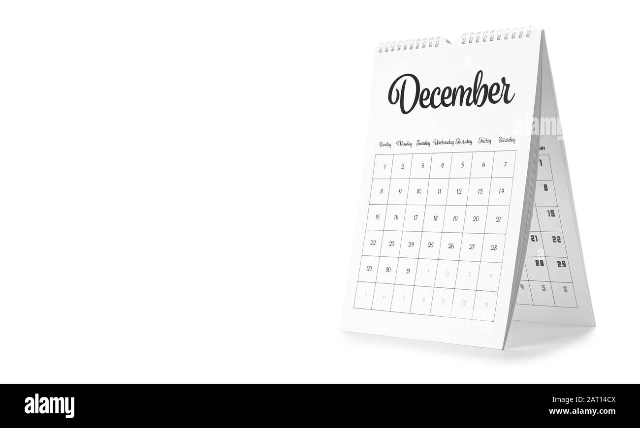 Flip calendar with page of December on white background Stock Photo - Alamy