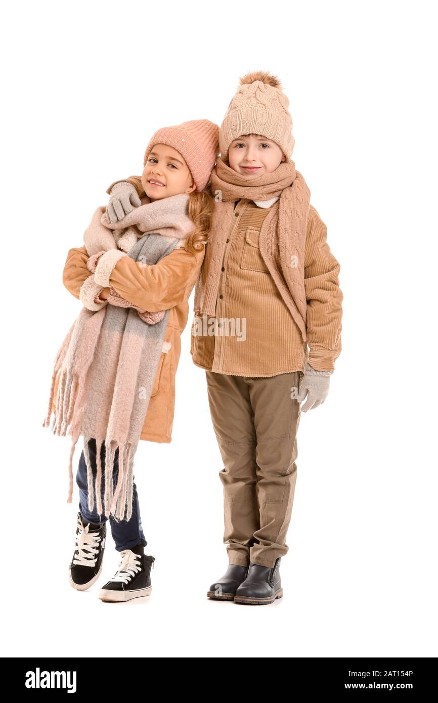 Little children in winter clothes on white background Stock Photo - Alamy