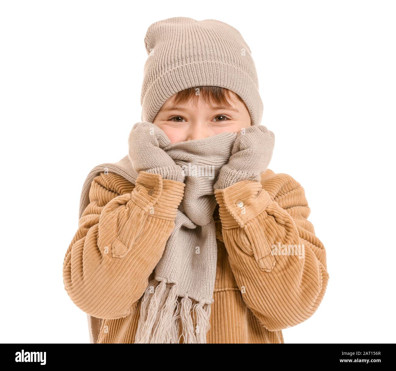 Cute little boy in winter clothes on white background Stock Photo - Alamy
