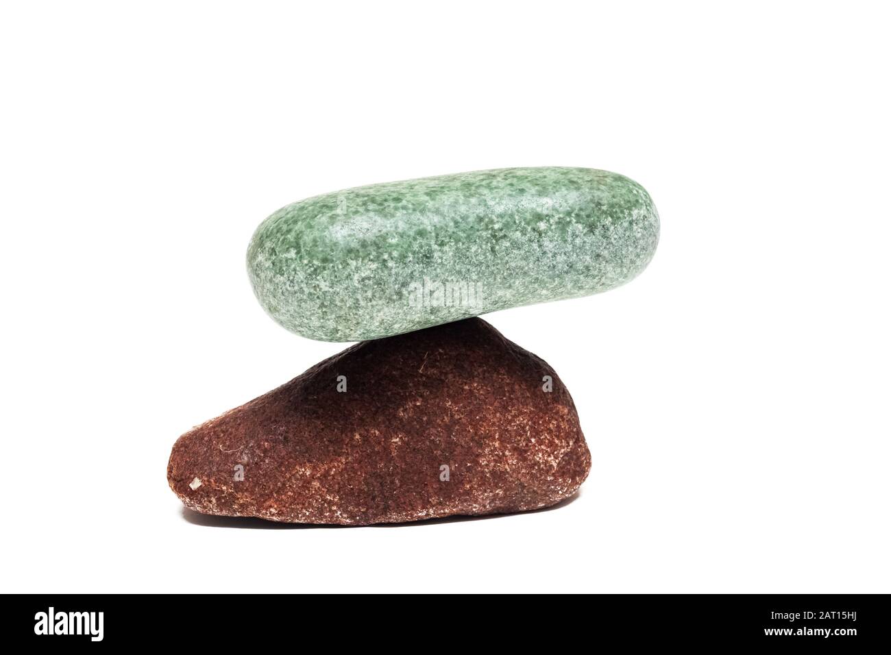 Two large stones, isolated on white background Stock Photo - Alamy