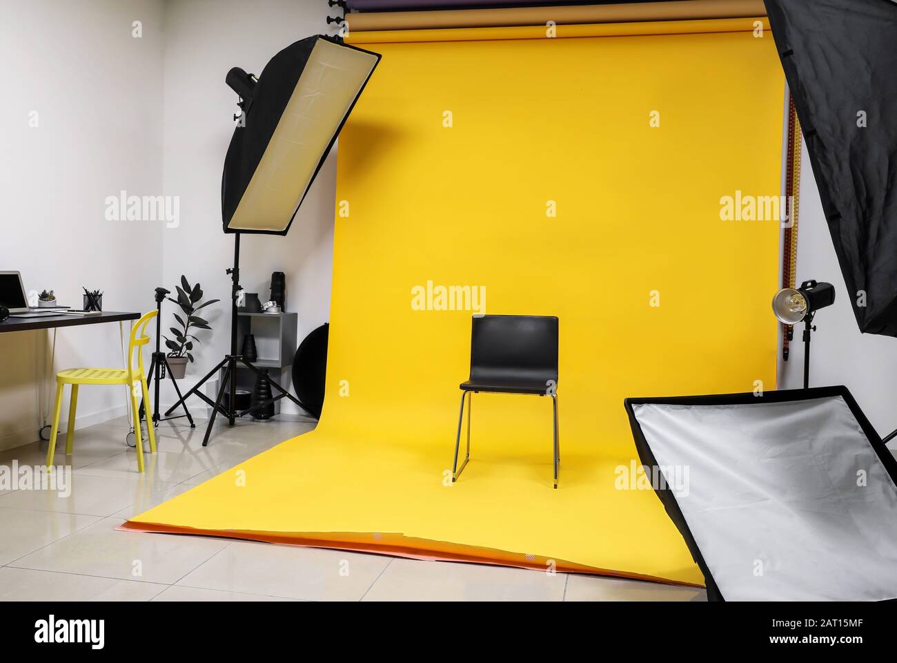 Chair and equipment in modern photo studio Stock Photo - Alamy