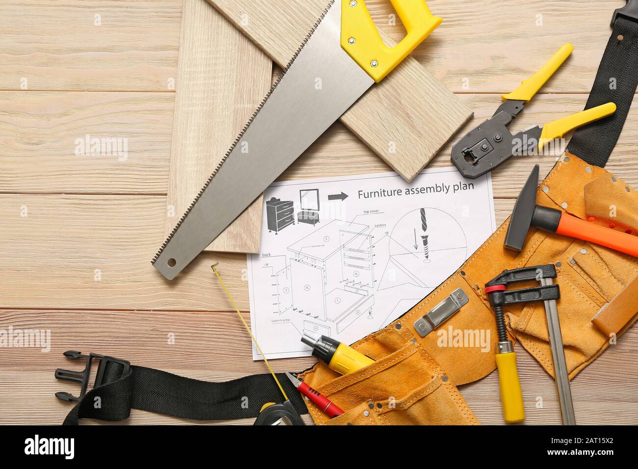 Furniture assembling plan with set of tools on table Stock Photo - Alamy