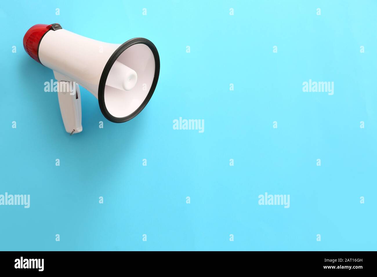 Modern megaphone on color background Stock Photo - Alamy