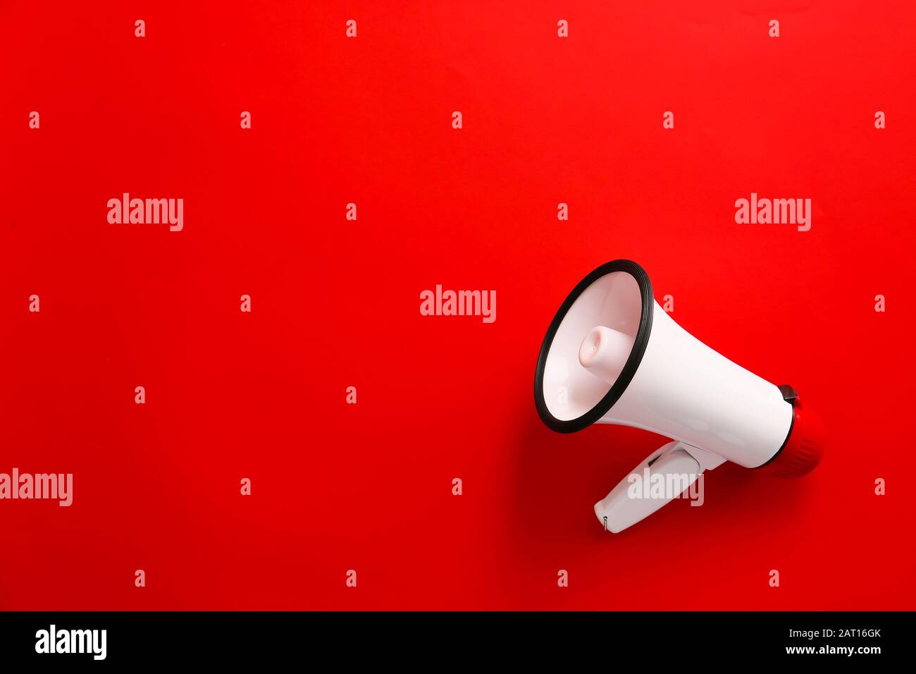 Modern megaphone on color background Stock Photo - Alamy
