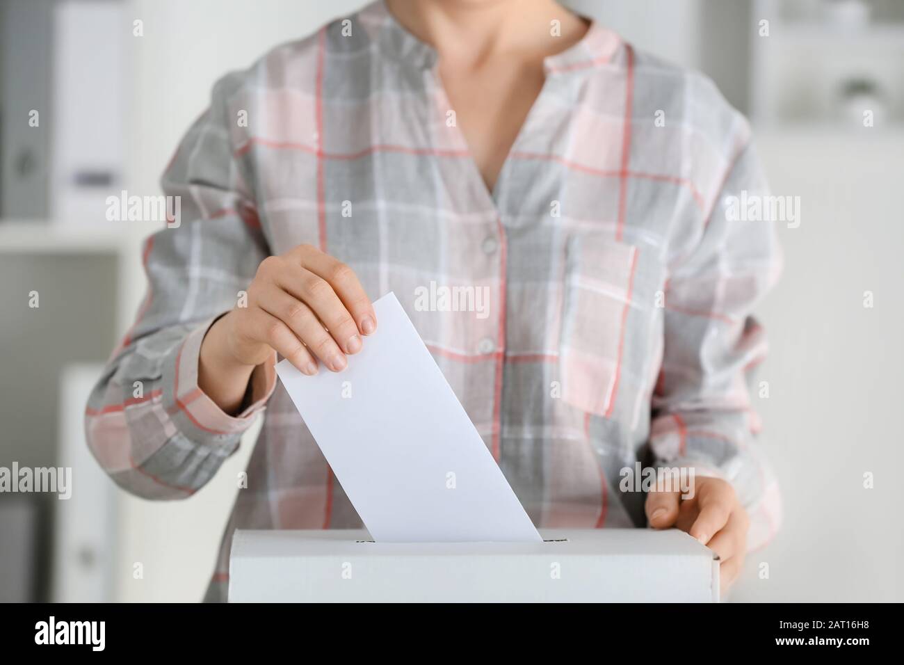 Voting woman near ballot box, closeup Stock Photo - Alamy