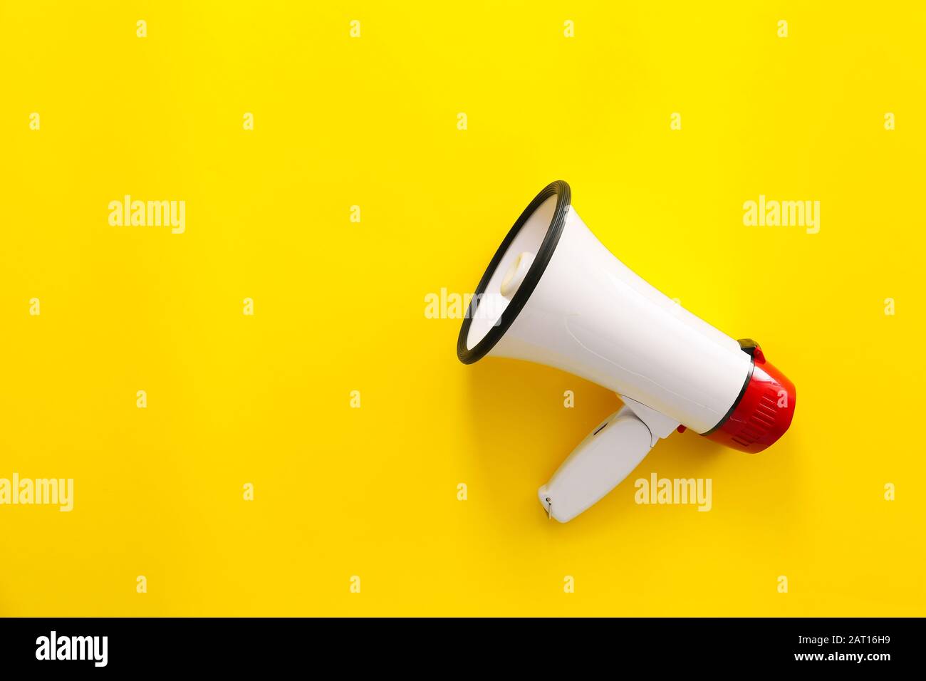 Modern megaphone on color background Stock Photo - Alamy