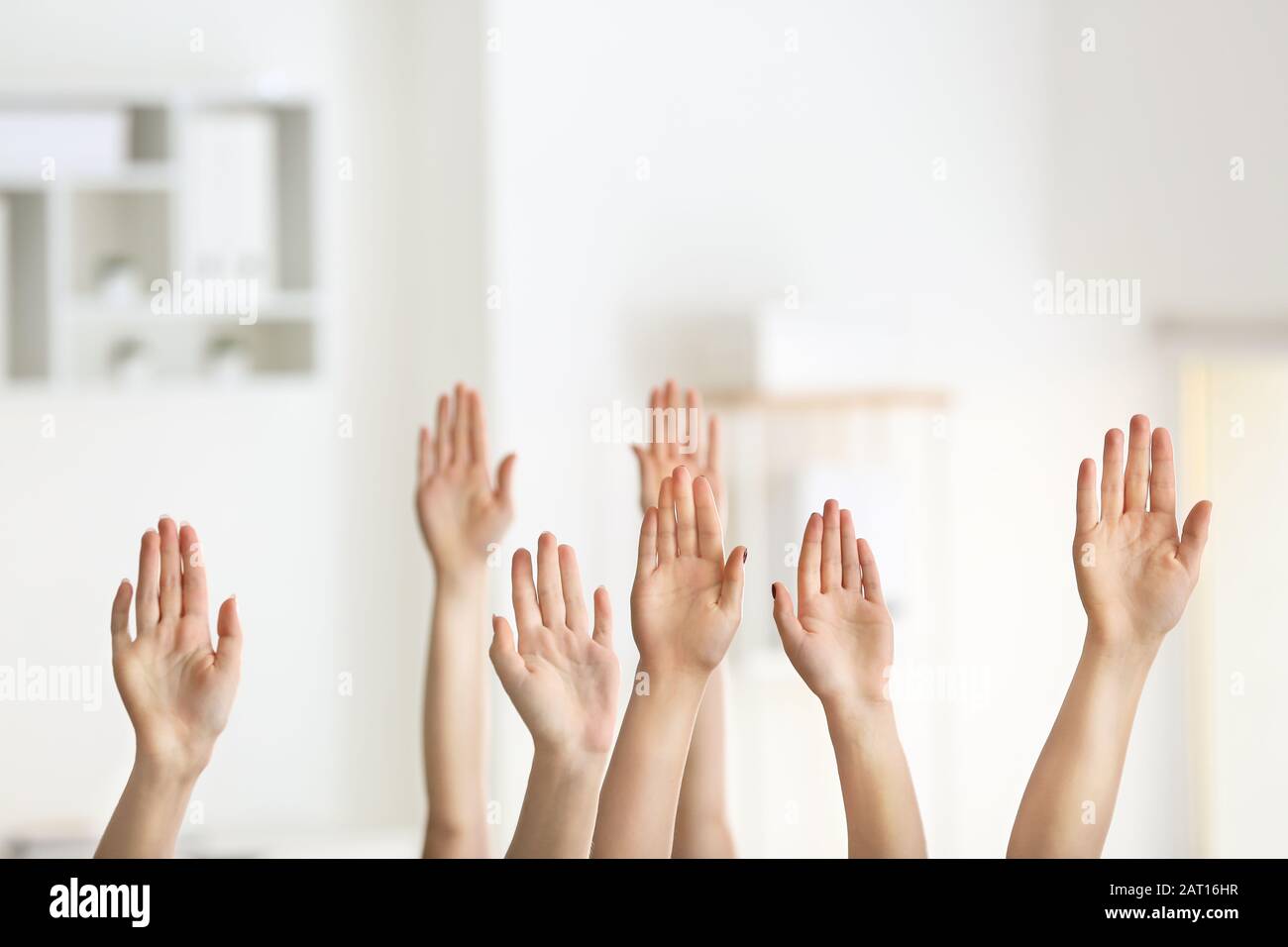 Voting raising hands hi-res stock photography and images - Alamy