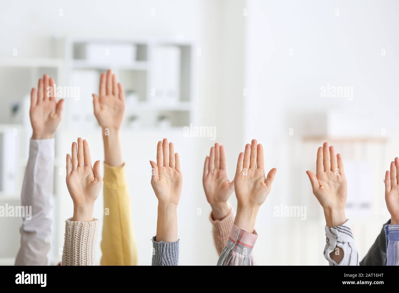 Voting raising hands hi-res stock photography and images - Alamy