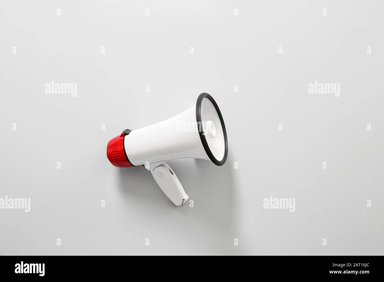 Modern megaphone on white background Stock Photo - Alamy