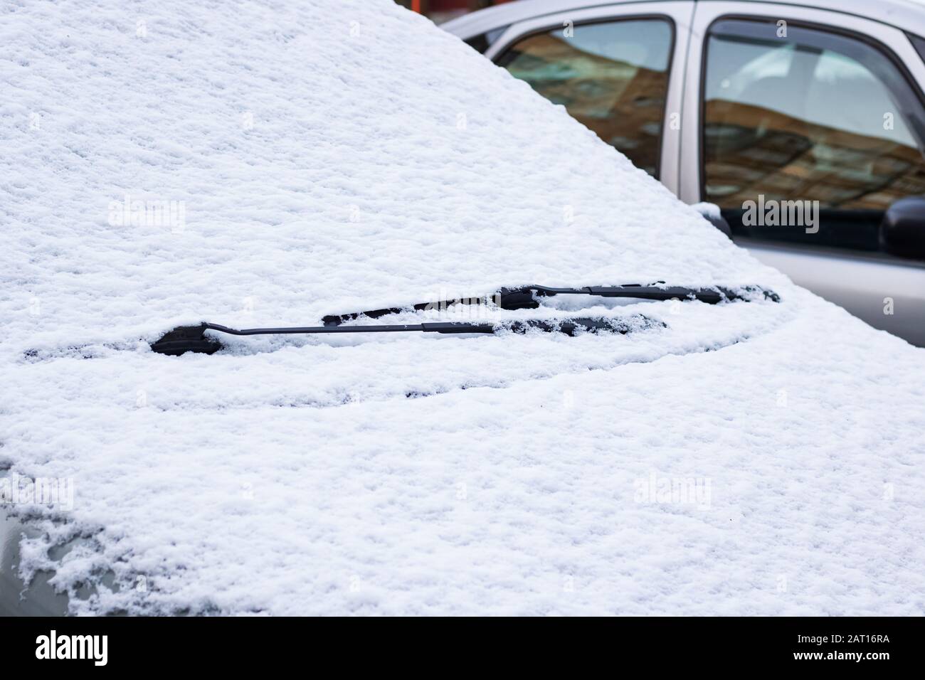 The first snow on a car windshield Stock Photo - Alamy