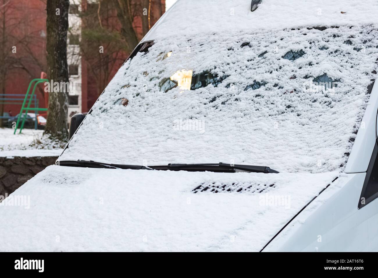 The first snow on a car windshield Stock Photo - Alamy