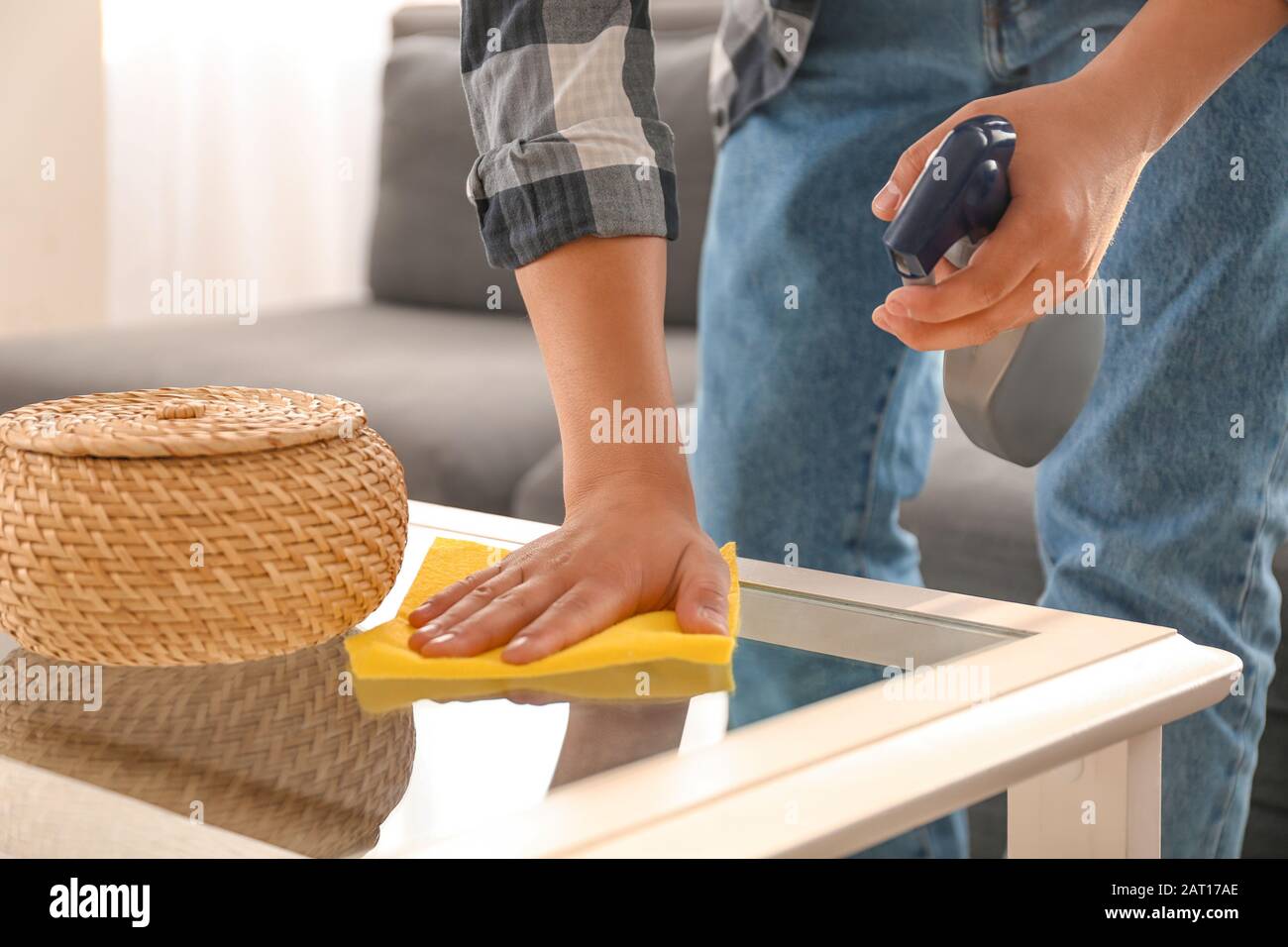 Young Asian man cleaning table at home Stock Photo - Alamy