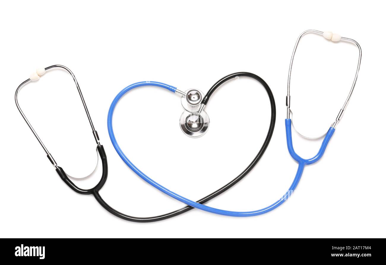 Stethoscopes making heart on white background. Cardiology concept Stock ...