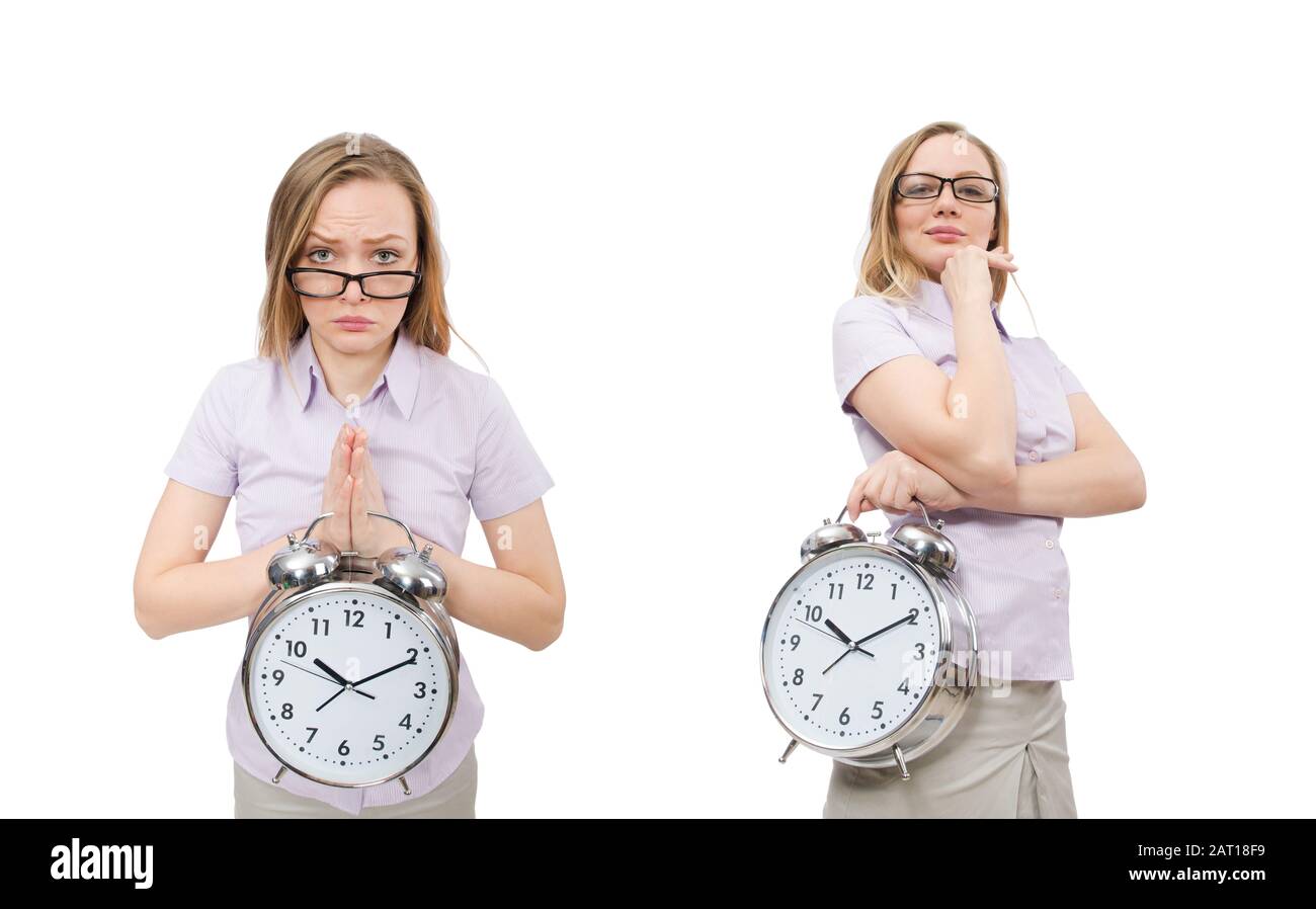 The young employee holding alarm clock isolated on white Stock Photo ...