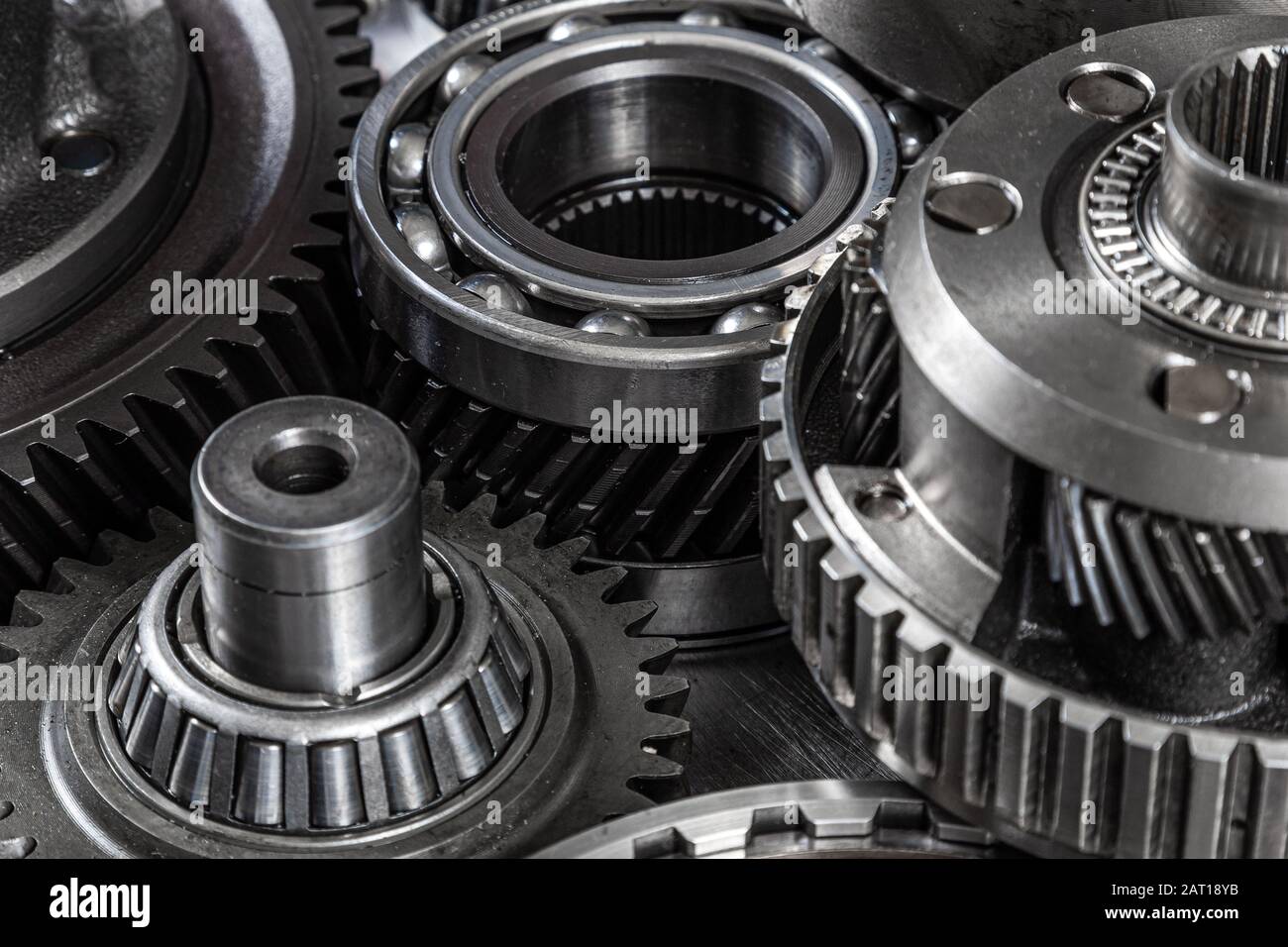 Close-up of a car gearbox. Metallic shiny gears for planetary gearshift ...