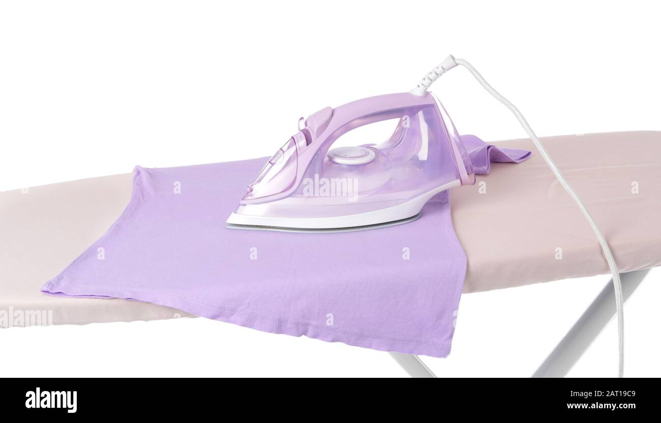Iron and clean clothes on board against white background Stock Photo ...