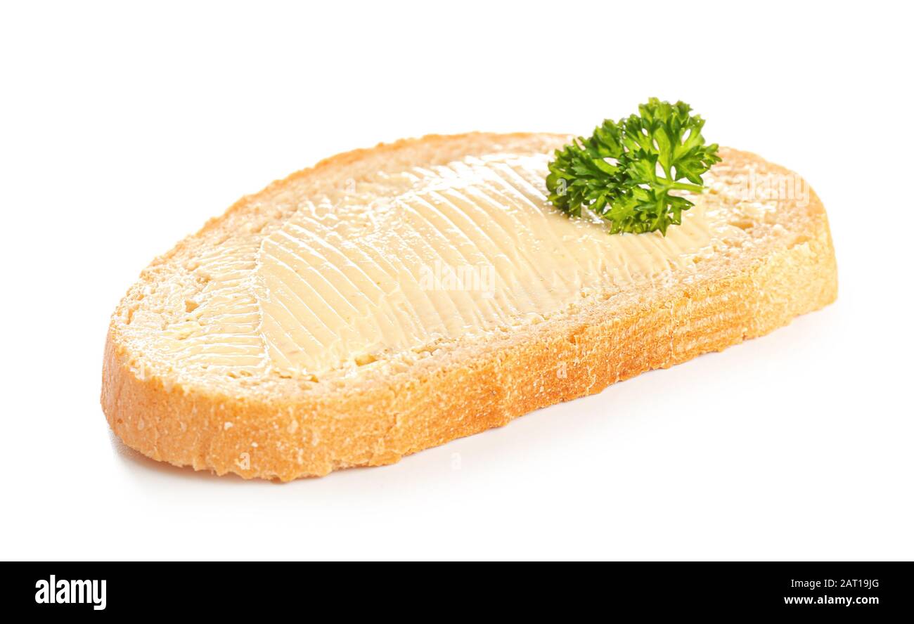 Slice of bread with butter on white background Stock Photo - Alamy