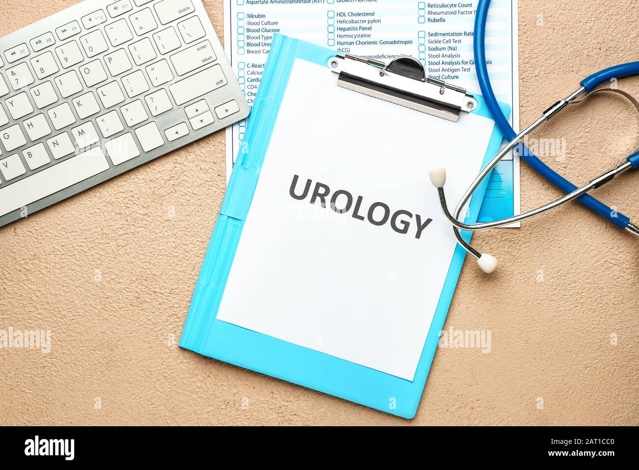 Paper sheet with text UROLOGY, stethoscope, laboratory test form and ...