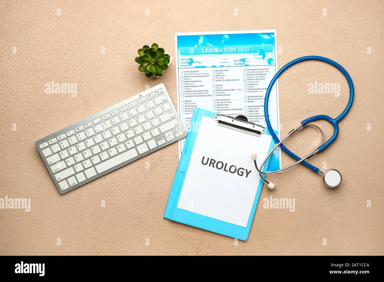 Paper sheet with text UROLOGY, stethoscope, laboratory test form and ...