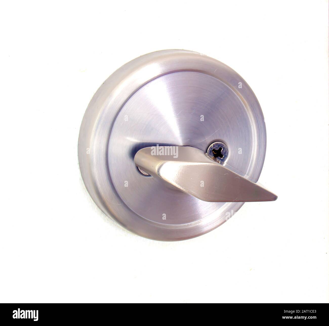 Shut off door with a round pocket door lock on a white door Stock Photo ...