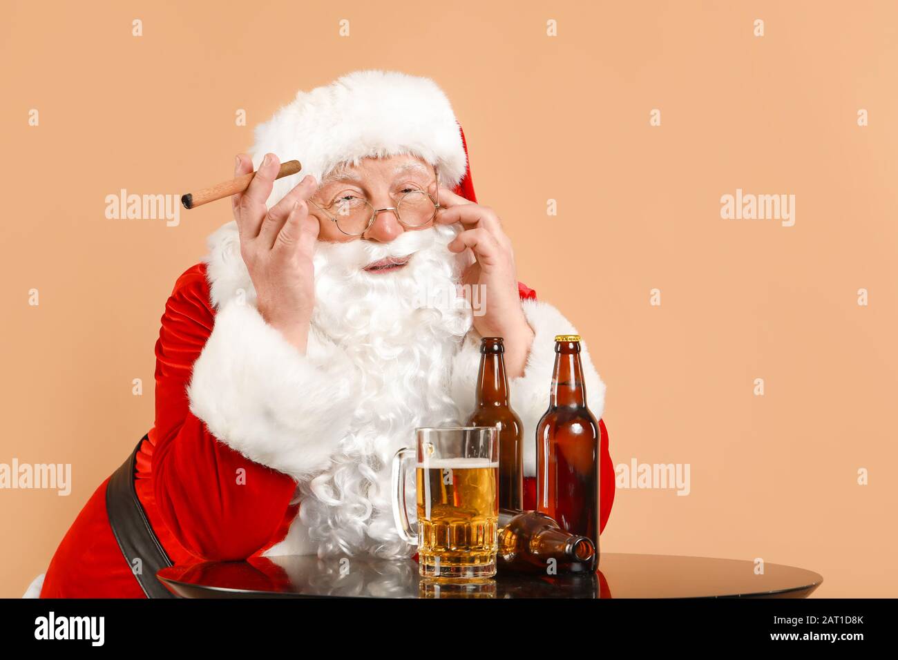 Funny drunk Santa Claus with alcohol and cigar on color background Stock Photo - Alamy