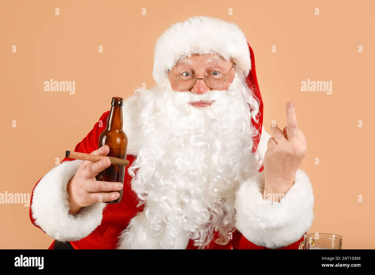 Funny drunk Santa Claus with alcohol and cigar on color background ...