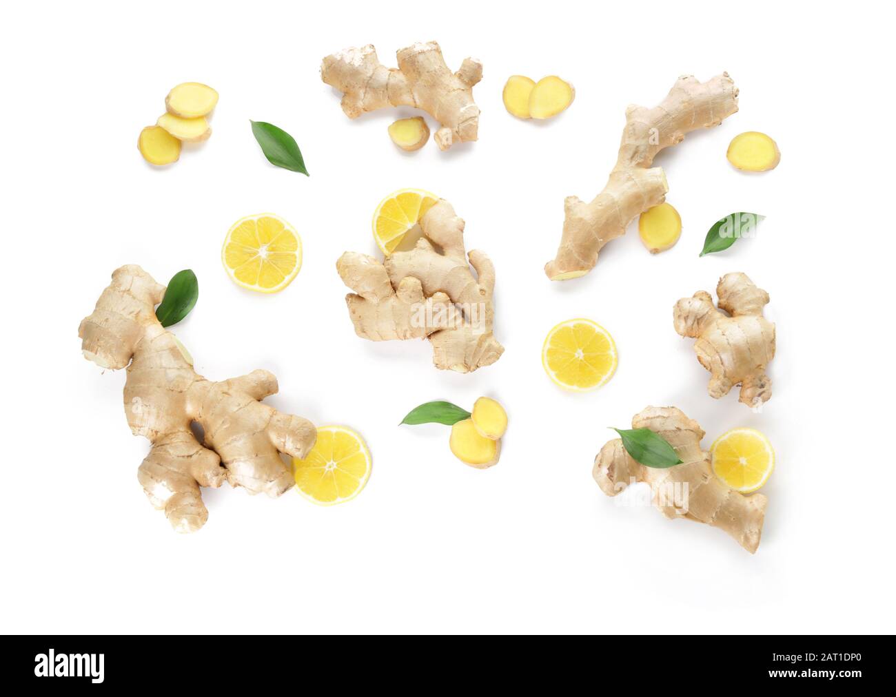 Slices of fresh ginger with lemon on white background Stock Photo - Alamy