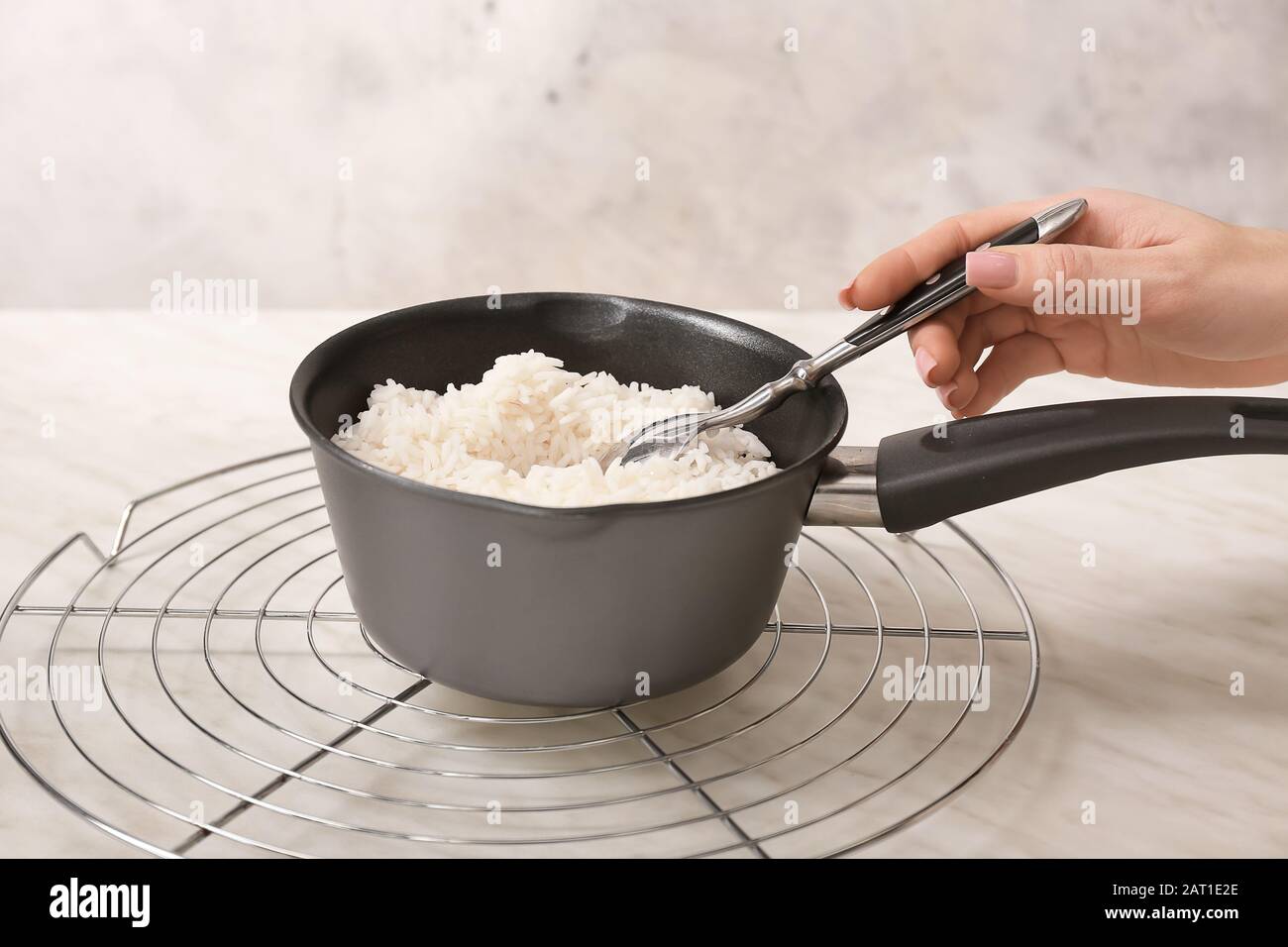 Rice boiling in saucepan hi-res stock photography and images - Alamy