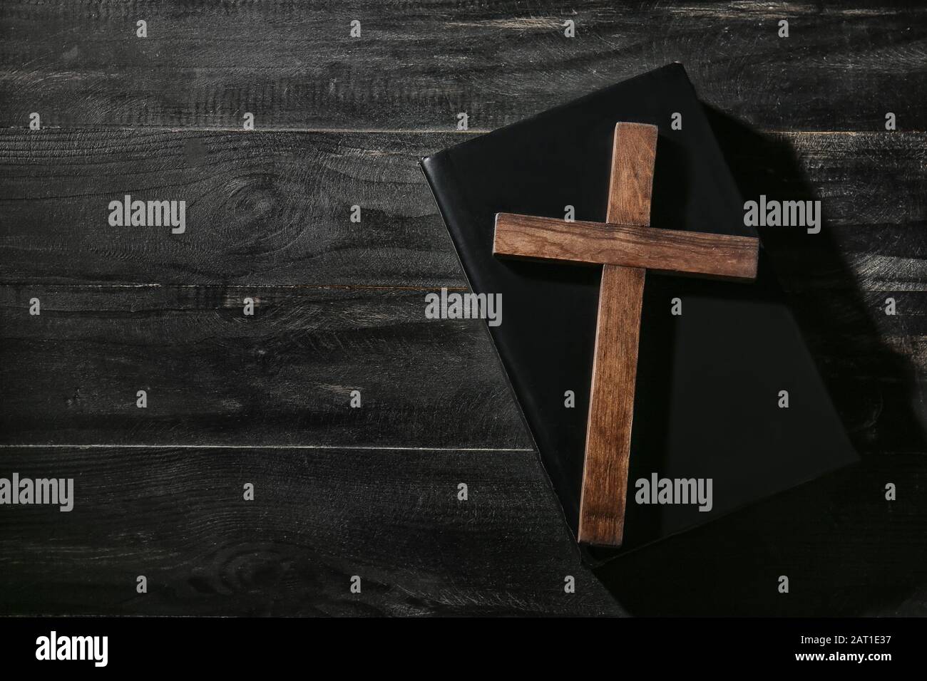 Christian cross and Bible on wooden background Stock Photo - Alamy