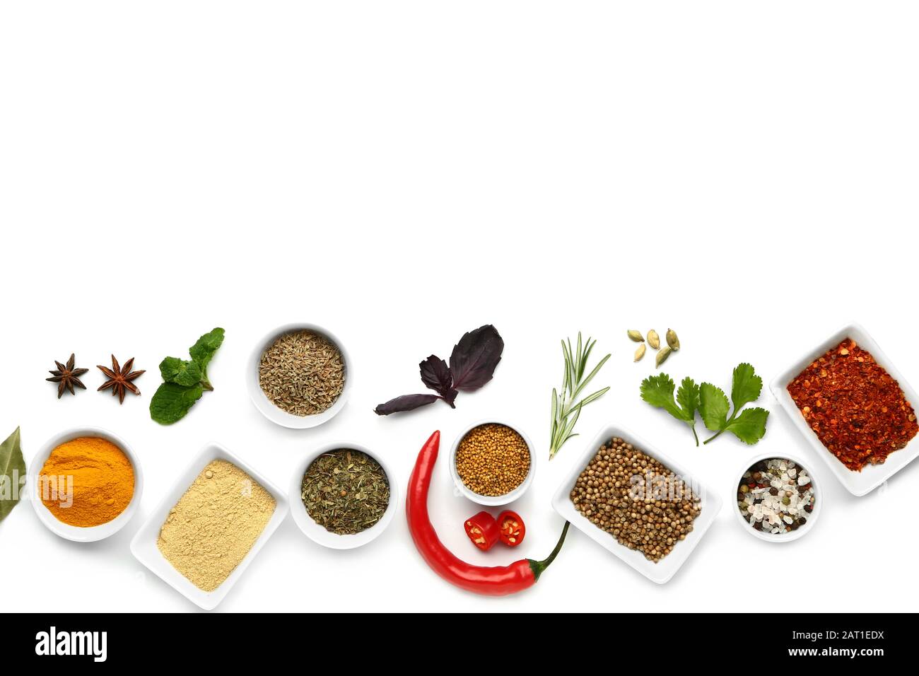 Many different spices on white background Stock Photo - Alamy