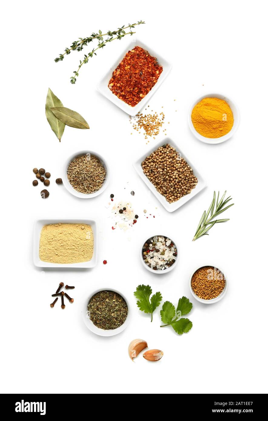 Many different spices on white background Stock Photo - Alamy