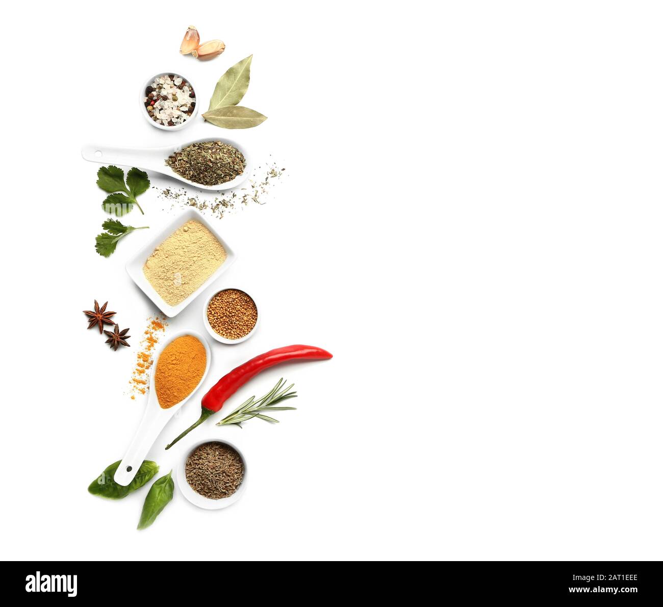 Many different spices on white background Stock Photo - Alamy