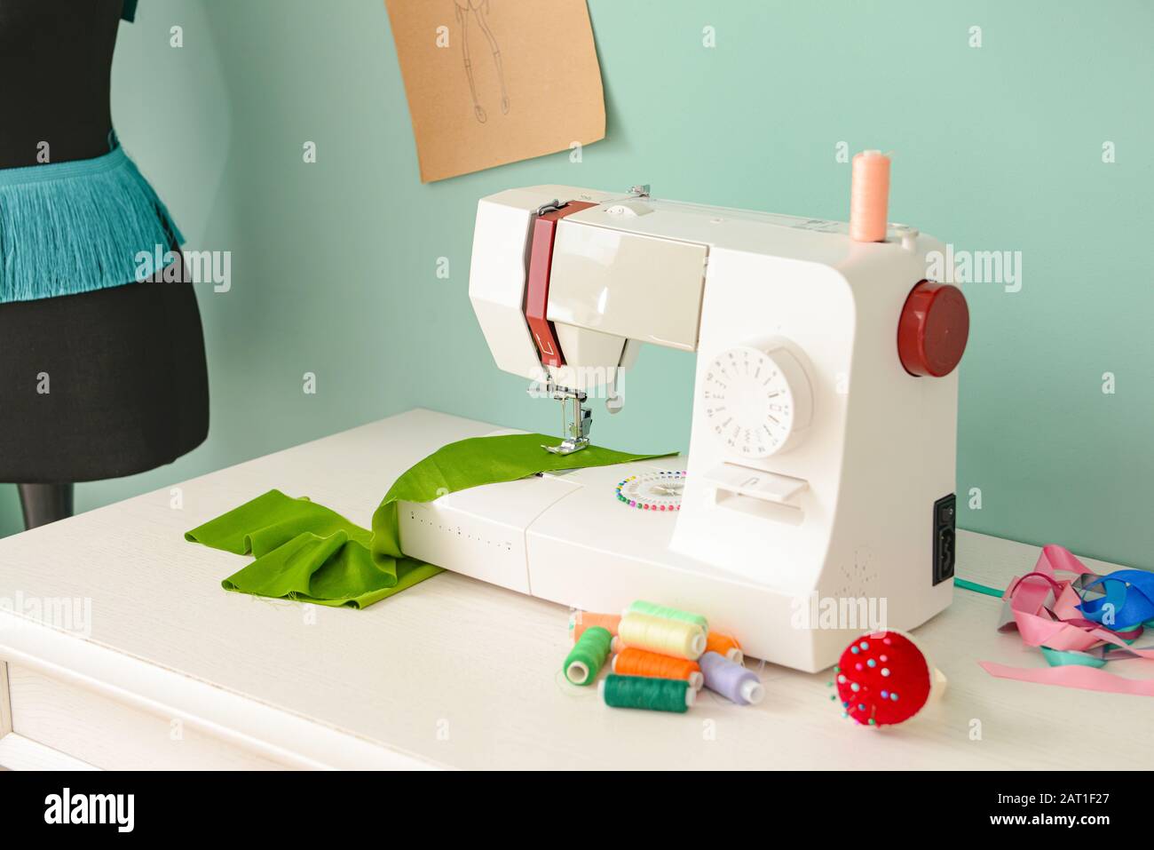Tailor's workplace in modern atelier Stock Photo - Alamy