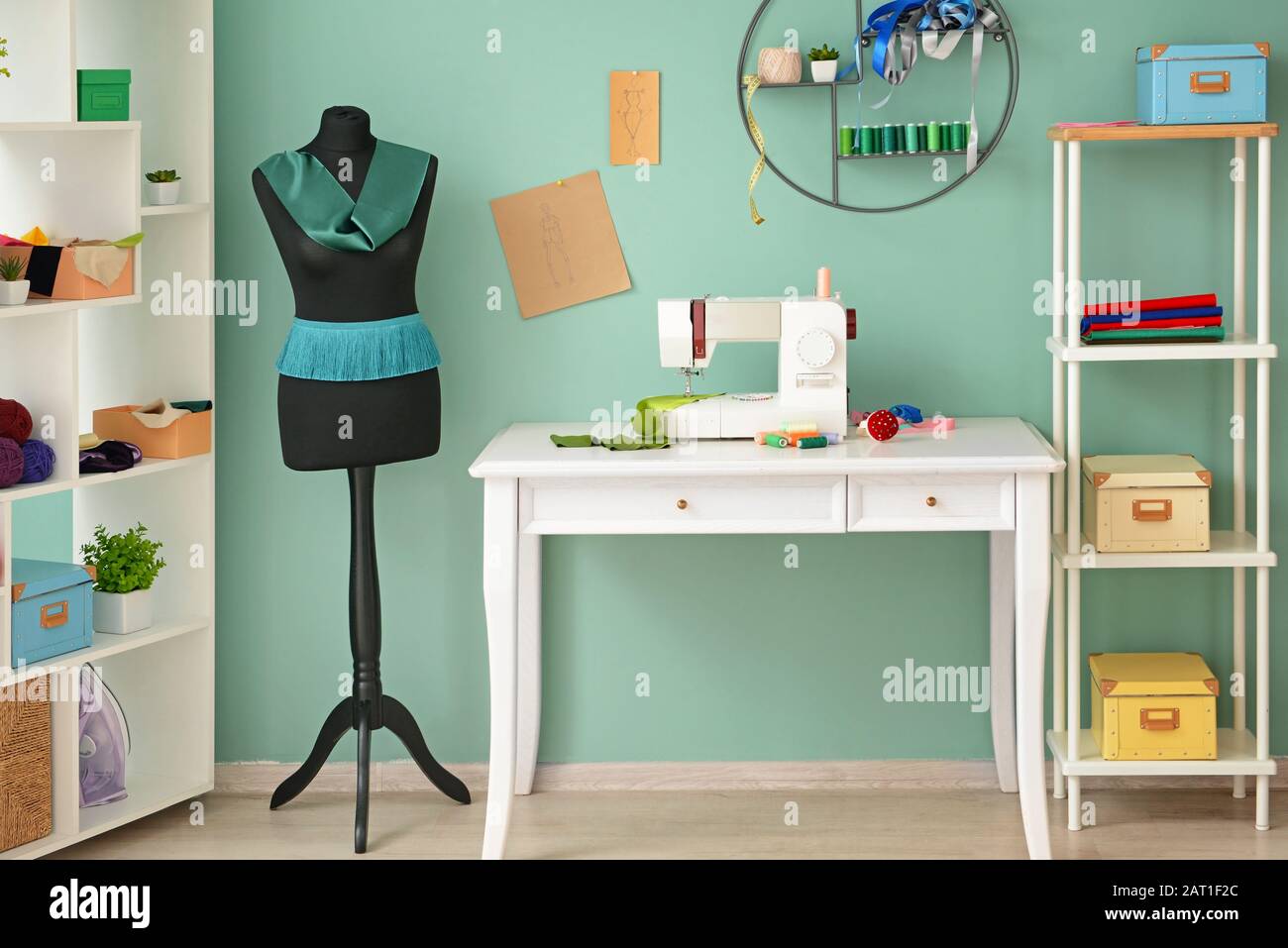 Interior of modern atelier with tailor's workplace Stock Photo - Alamy