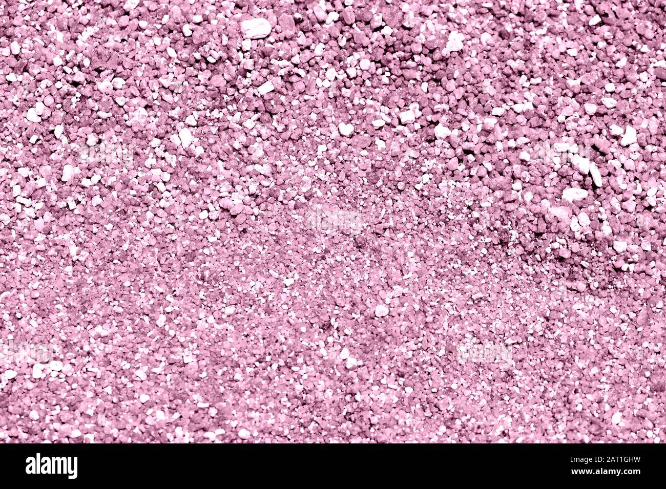 Coastal sand texture close-up. Natural background pink color toned ...